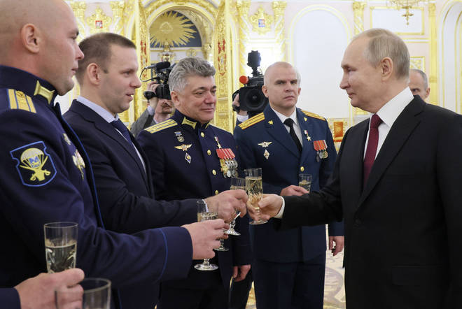 Champagne-swilling Putin vows more missile strikes on Ukraine - LBC Champagne-swilling Putin vows more missile strikes on Ukraine - LBC